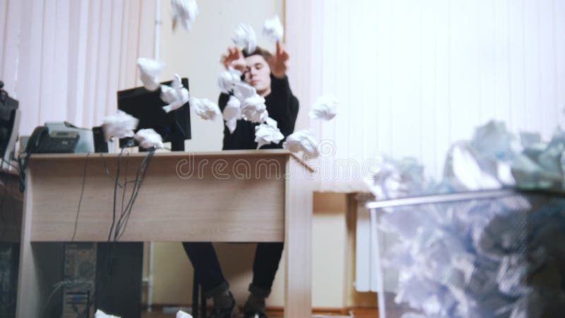 A Man Throws Crumpled Paper Away from the Table Stock Image - Image of ...
