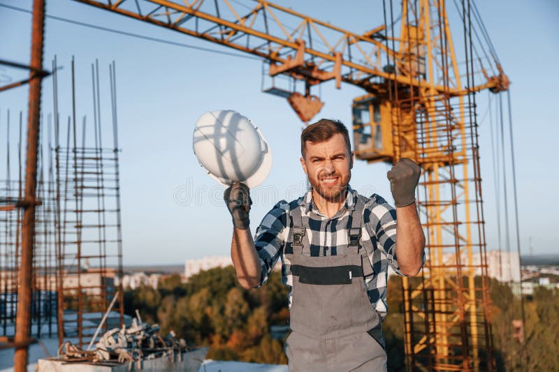 Angry Man is Working on the Construction Site at Daytime Stock Photo ...