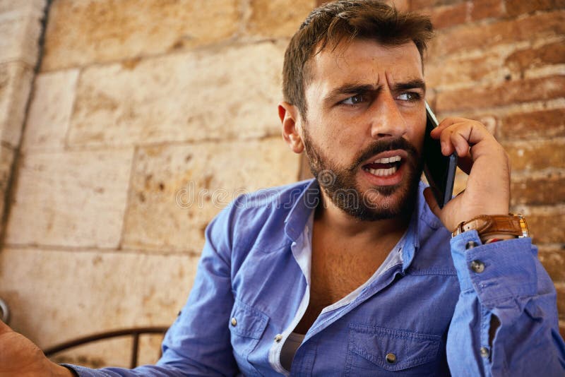 Angry Man Working and Talking on Phone at Street Stock Image - Image of ...