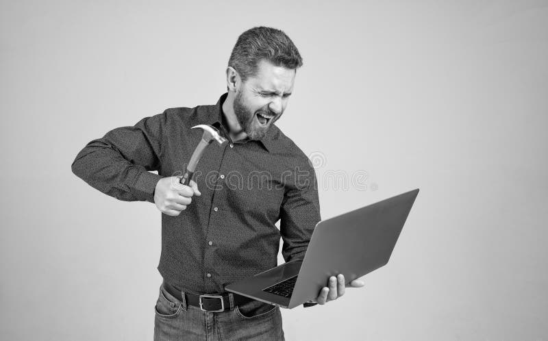 Angry Mature Man Businessman Crashing Computer with Hammer, Stress ...