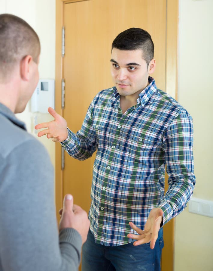 Angry Men Looking at Each Other with Clenching Fists Stock Image ...