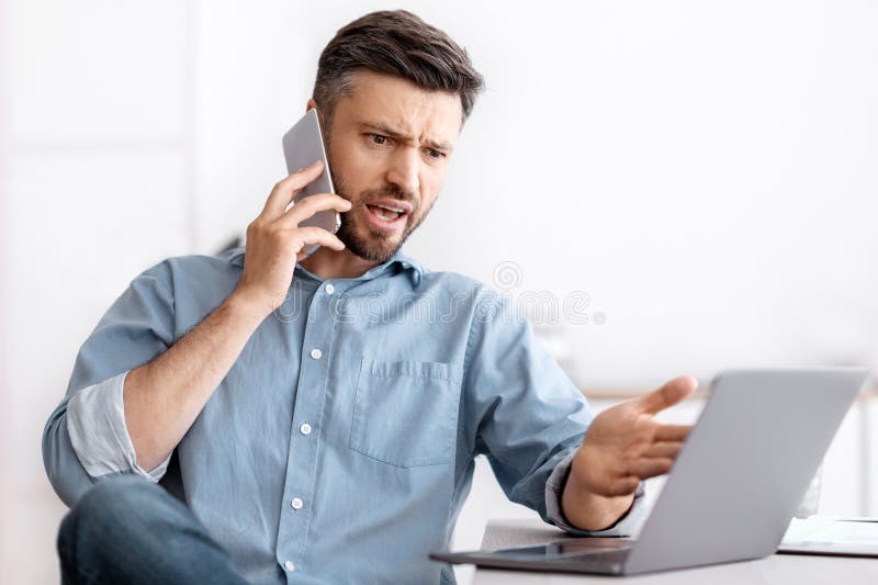 Angry Businessman Talking Cellphone Looking Laptop Screen Office Stock ...