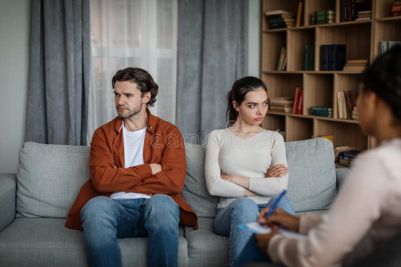 Angry Millennial Caucasian Woman Ignores Man On Consultation With