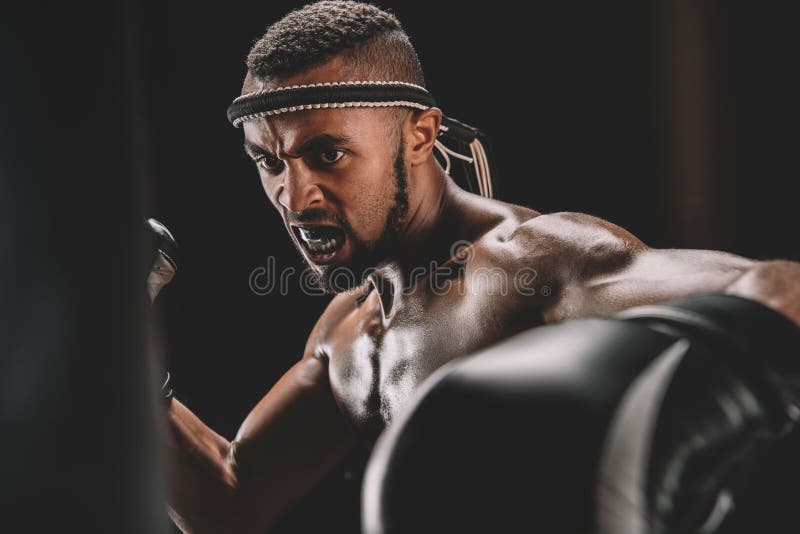 Angry Muay Thai Fighter Training on Black Stock Image - Image of ...