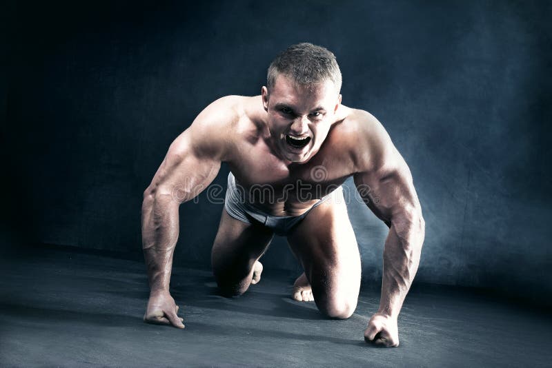 Angry muscular man. stock image. Image of bodybuilding - 52028859