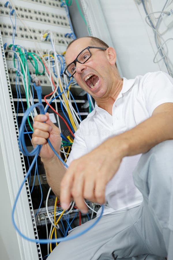 Angry Network Engineer in Server Room Stock Photo - Image of debugging ...