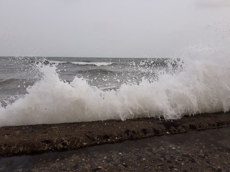 Angry Wave Coming Towards Rocks on the Shore Stock Image - Image of ...