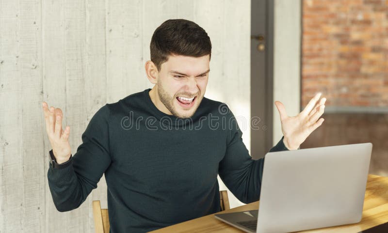 Angry Office Worker Shouting Sitting at Laptop at Workplace Indoor ...