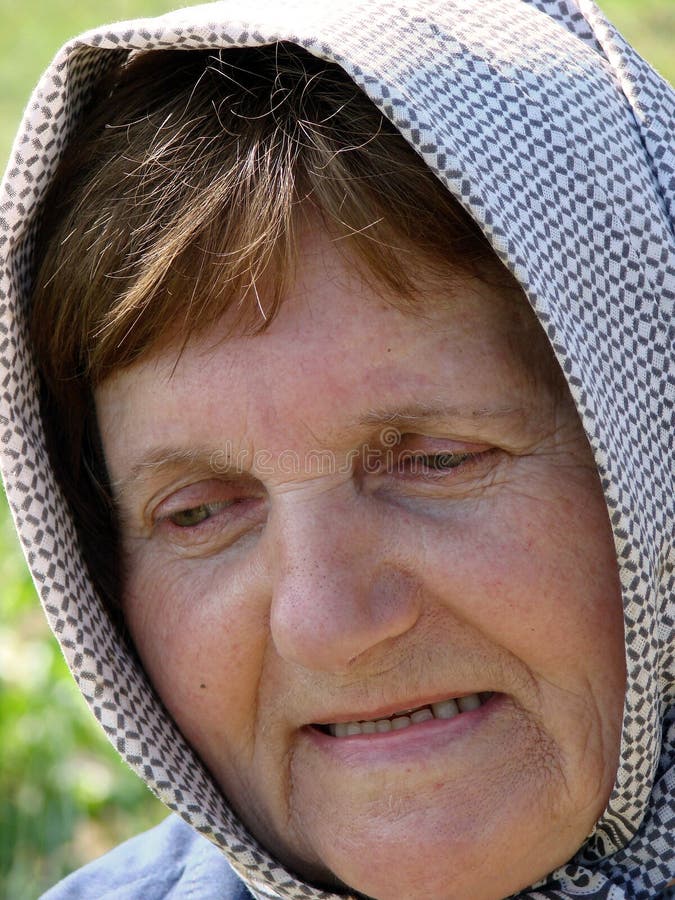 Angry old woman with scarf stock photo. Image of head - 2507074
