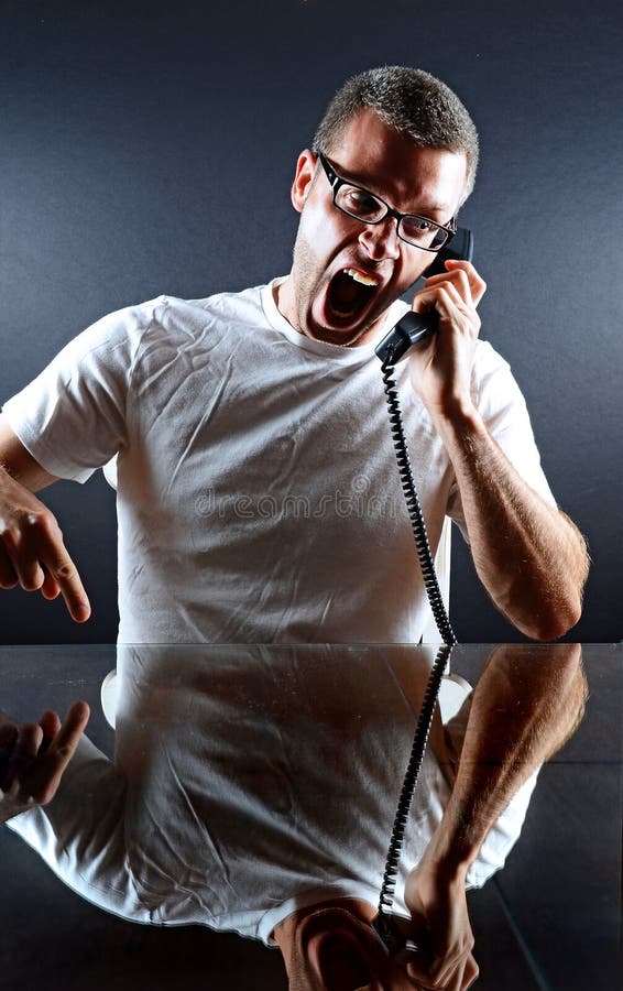 Angry on the Phone stock image. Image of landline, deal - 25604831