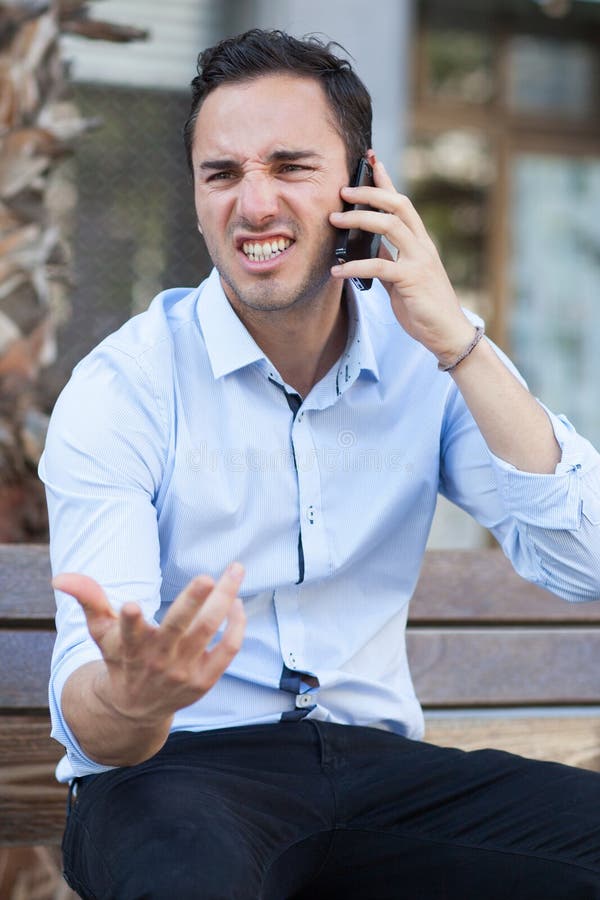 Angry on phone stock image. Image of bench, business - 41023371