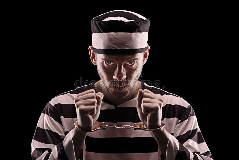 A Sad Prisoner in Jail Holding Bars Stock Image - Image of penitentiary ...