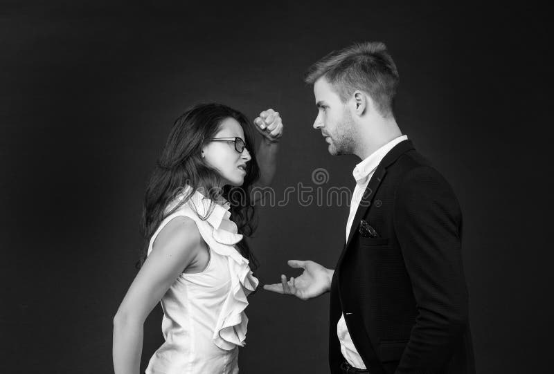 Angry Professional Woman Clench Fist At Male Coworker In Formalwear