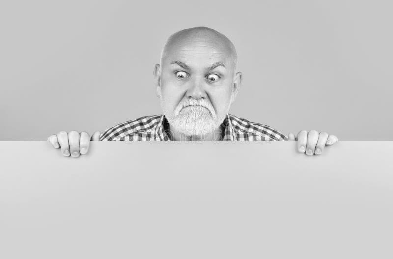 Angry Senior Man with Copy Space on Blank Banner. Advertising Stock ...