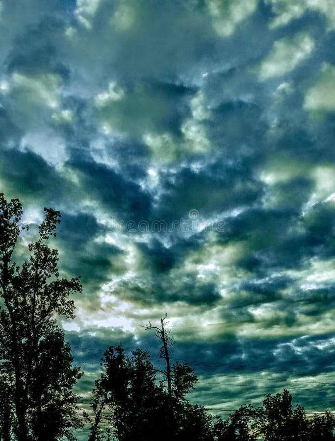 Angry sky amongst us stock image. Image of dawn, angry - 230397709