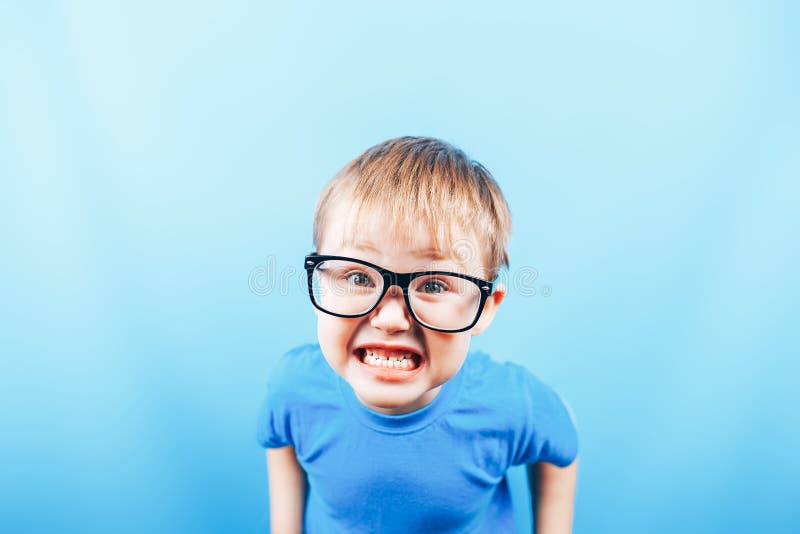 Angry Small Boy Looking at Camera in Glasses Stock Image - Image of ...