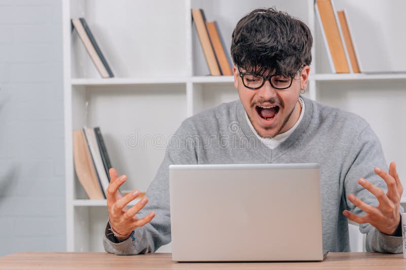 Angry Student Looking at the Laptop Stock Image - Image of university ...
