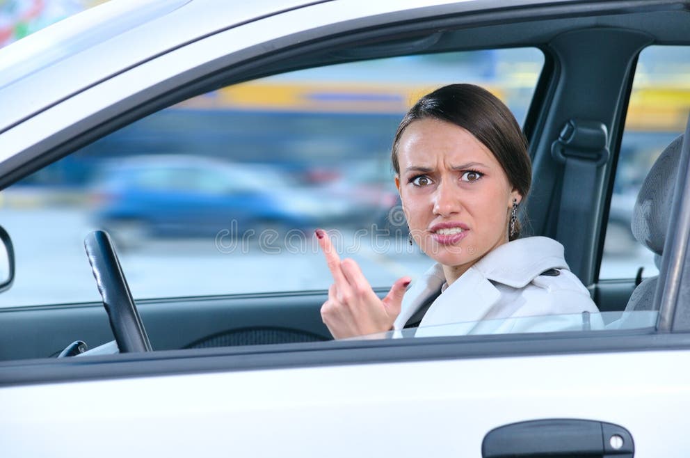 Angry woman in a car stock image. Image of outside, outdoors - 16686303