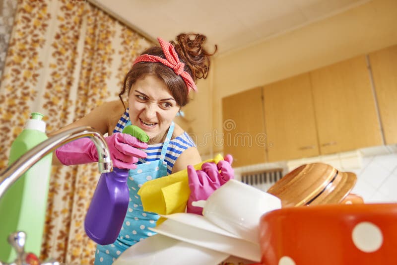 Angry woman in the kitchen stock image. Image of mopping - 50617417