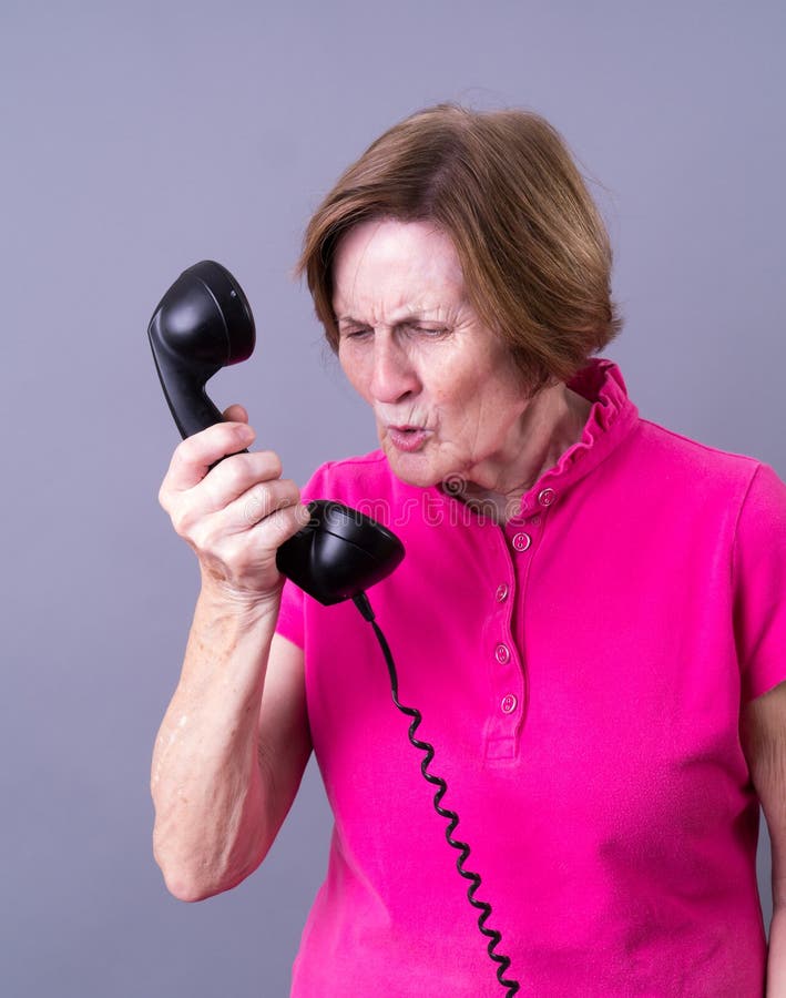 Angry Women with Vintage Telephone Stock Photo - Image of senior, angry ...