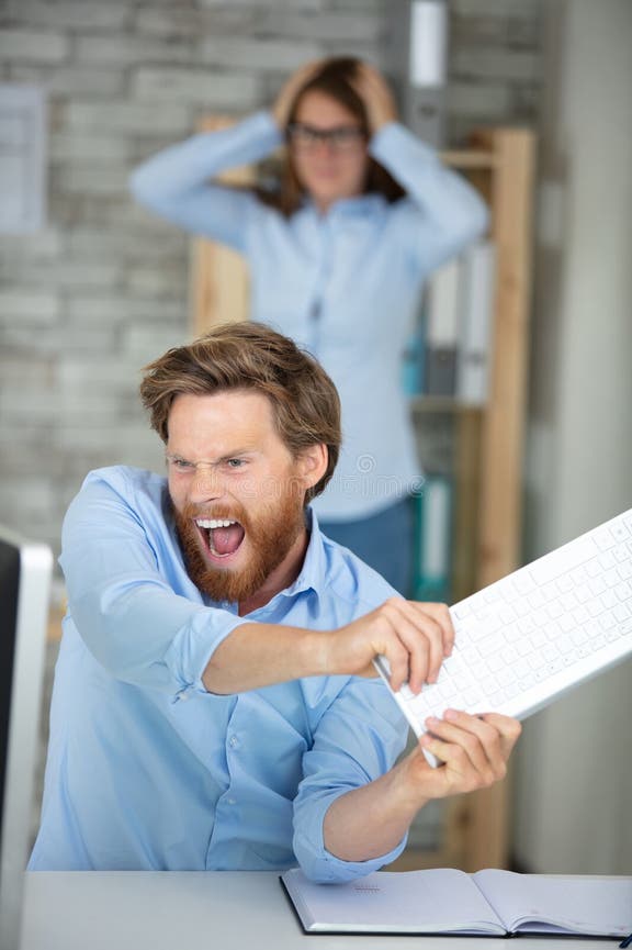 Angry Worker Destroying Computer with Keyboard Stock Image - Image of ...