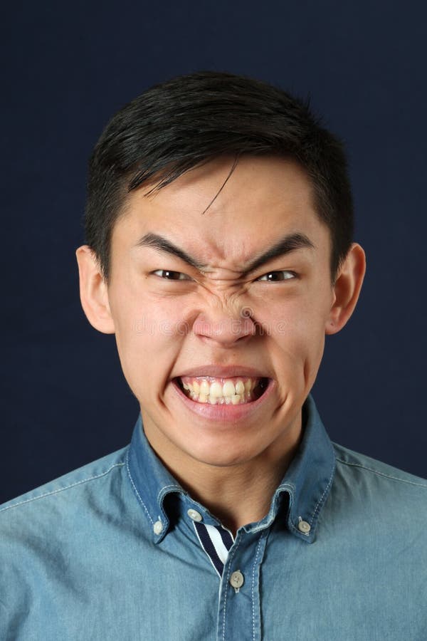Angry Young Asian Man Making Face Stock Photo - Image: 52282607