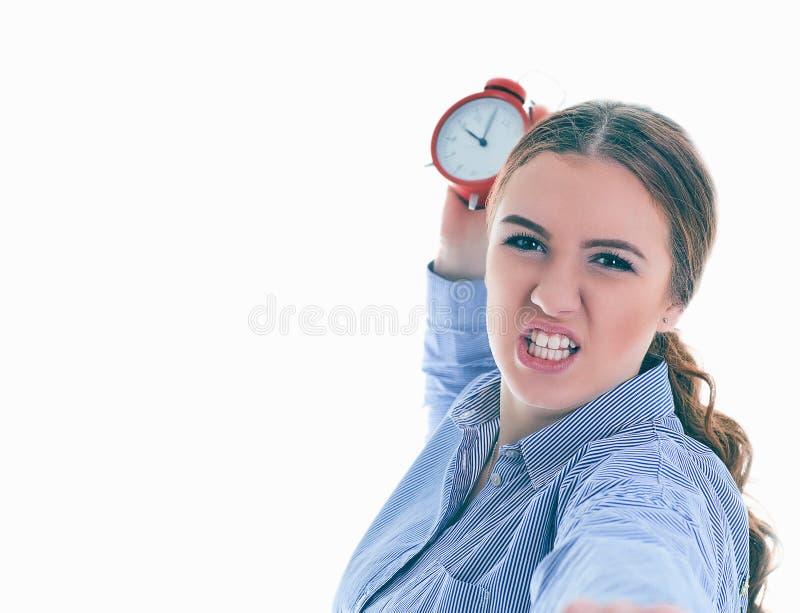 Angry Young Caucasian Woman Throwing An Alarm Clock Isolated In White ... Angry Young Caucasian Woman Throwing An Alarm Clock Isolated In White ...