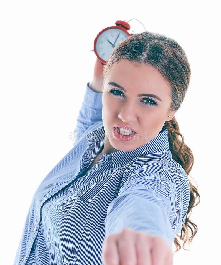 Angry Young Caucasian Woman Throwing an Alarm Clock Isolated in White ... Angry Young Caucasian Woman Throwing an Alarm Clock Isolated in White ...