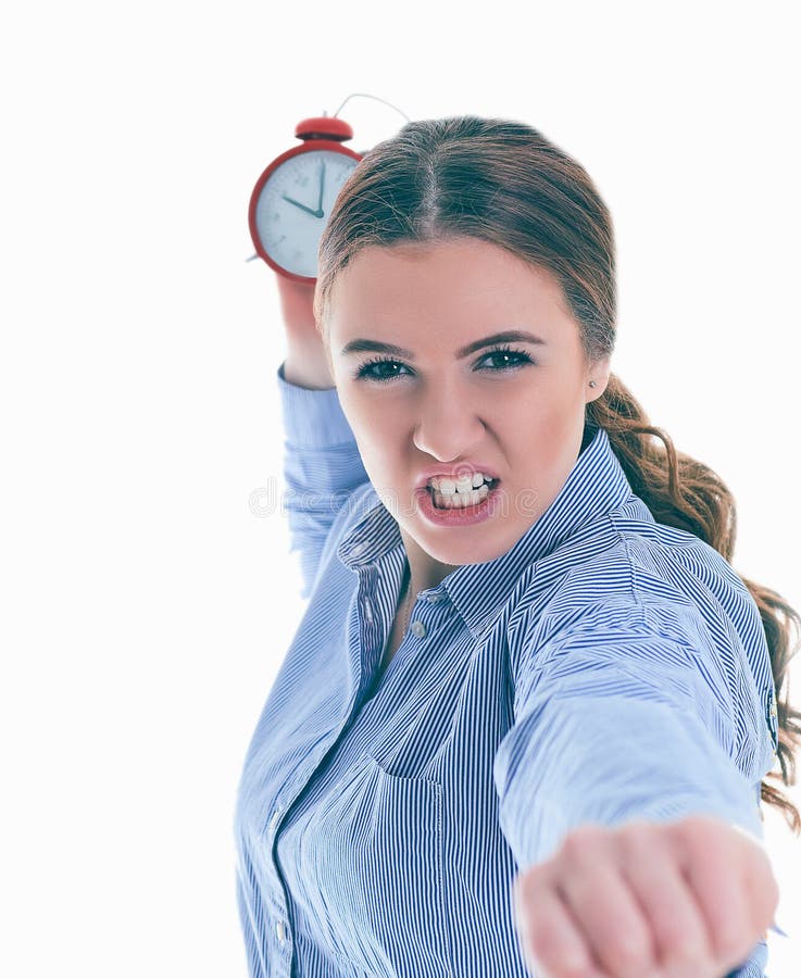 Angry Young Caucasian Woman Throwing An Alarm Clock Isolated In White ... Angry Young Caucasian Woman Throwing An Alarm Clock Isolated In White ...