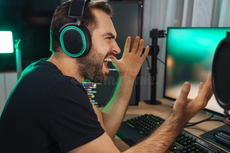 Angry Young Gamer Playing Game on Computer Stock Photo - Image of young ...