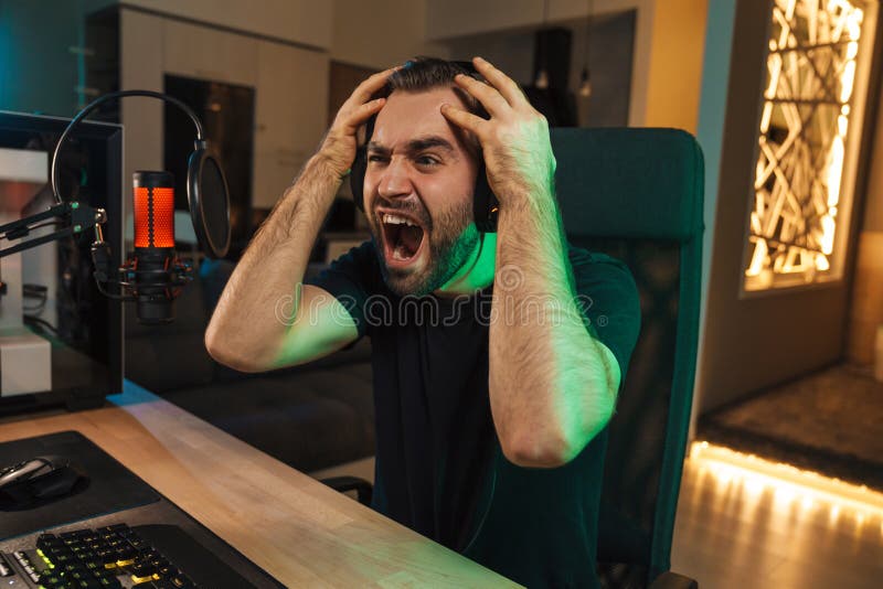 Angry Young Gamer Playing Game on Computer Stock Image - Image of game ...