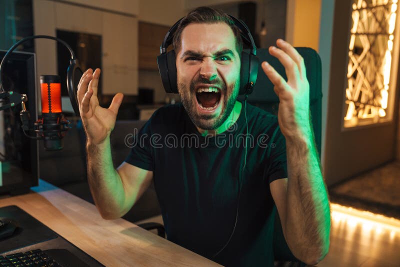 Angry Young Gamer Playing Game on Computer Stock Photo - Image of young ...