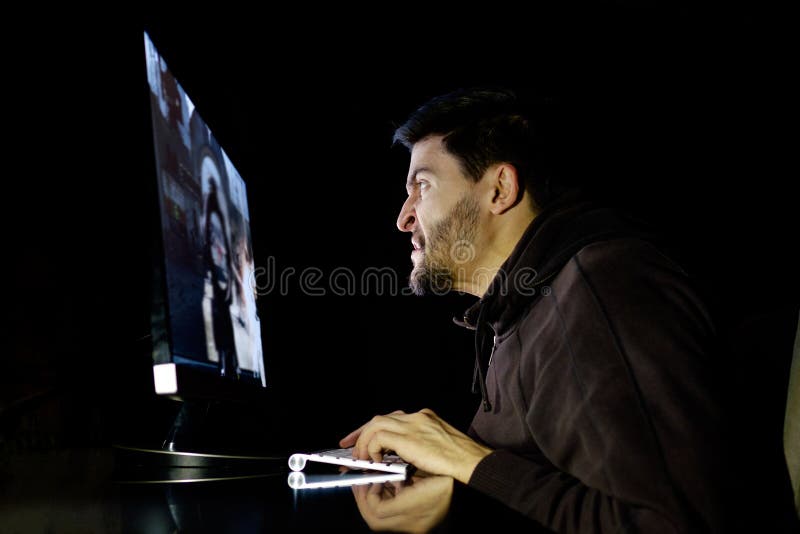 Angry Young Gamer Playing Videogame Stock Photo - Image of evening ...