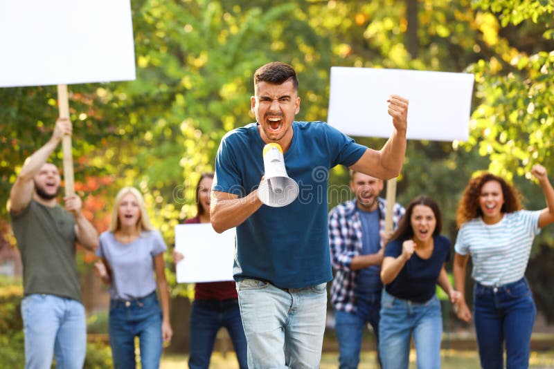 Angry Young Man with Megaphone at Protest Stock Photo - Image of banner ...