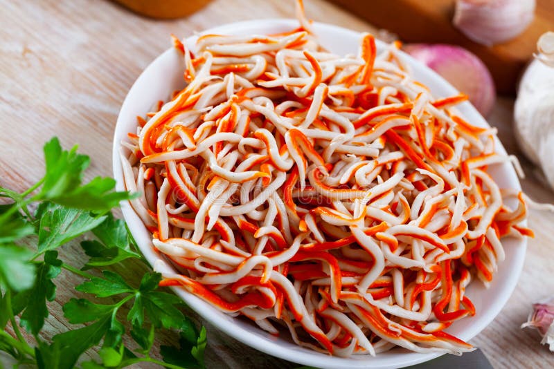 Angula eel fry on plate stock image. Image of knife - 200155771