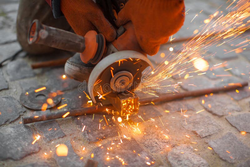 Angular Grinding Machine Cuts Metal with Sparks. Stock Image - Image of ...