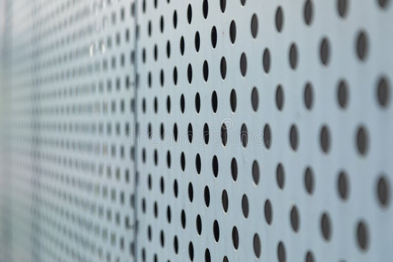 Angular View of Metallic Surface with Round Openings Stock Image ...
