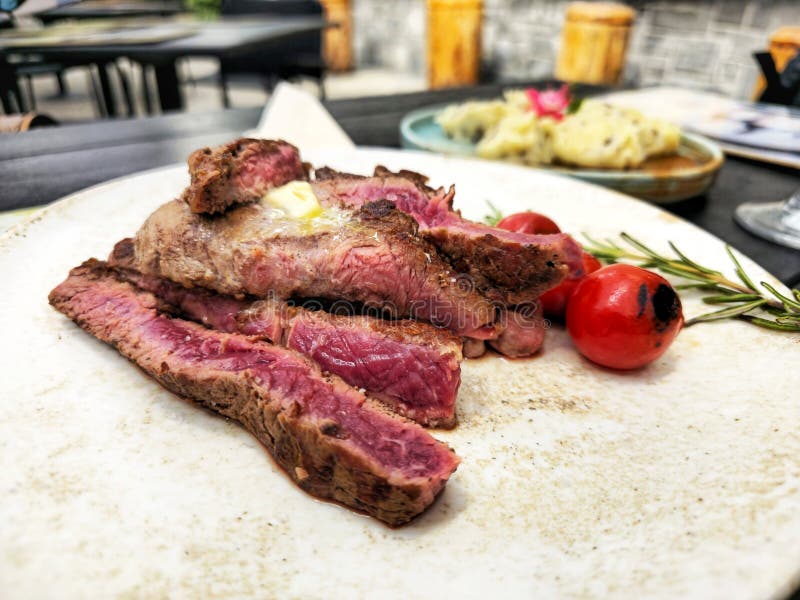 Angus Beef Steak on a White Big Plate Stock Photo - Image of white ...