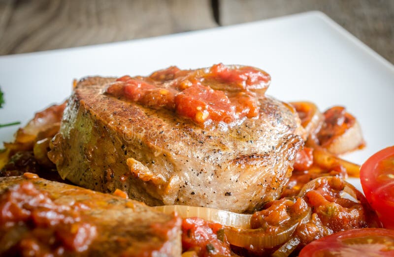 Angus Beef Steaks with Roasted Tomato Sauce Stock Image - Image of ...
