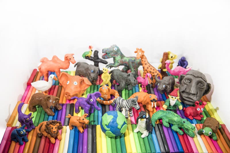 Animals Made from Play Clay with Earth Planet in Middle Stock Photo ...