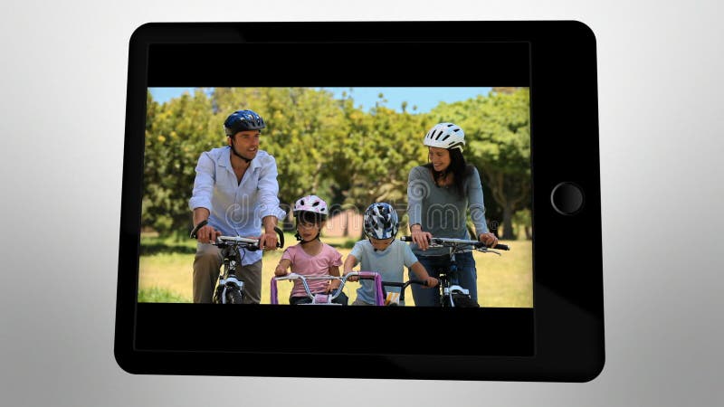 Animated Tablet Computer Showing Family Having Fun Stock Video - Video ...