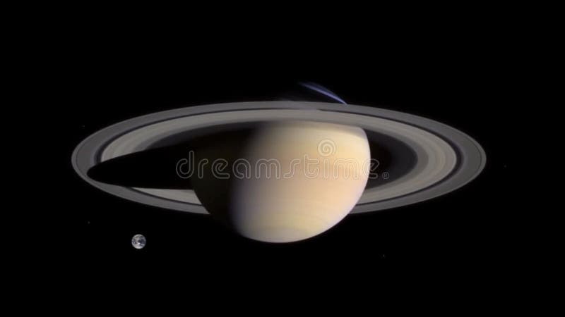 Animation Depicting Visual Comparison of Earth and Saturn. Stock Video ...