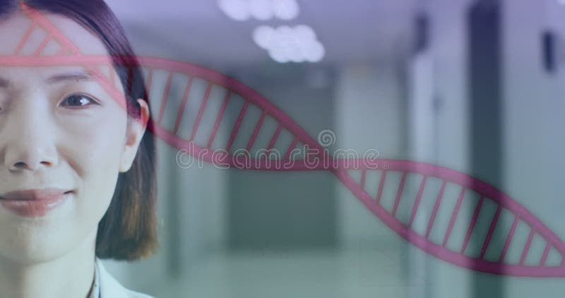 Animation of Dna Strand Over Asian Female Doctor Stock Footage - Video ...