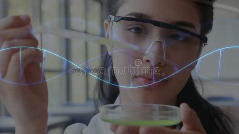 Animation of Dna Strand Over Caucasian Female Scientist Doing ...