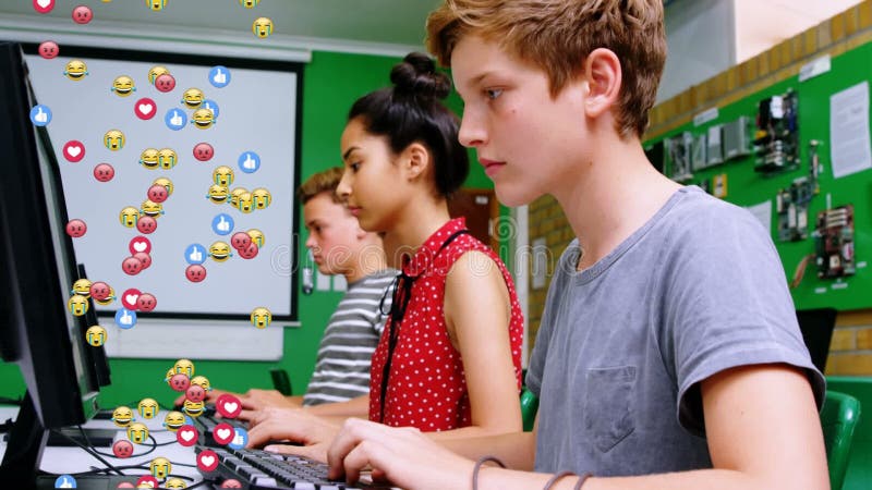 Animation of Emoticons Over Happy Diverse Students Using Computers at ...