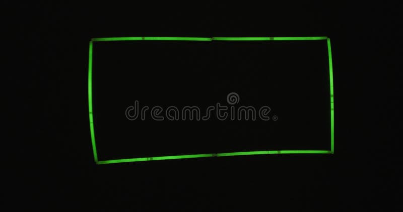 Animation of Green Neon Glow Sticks Forming Rectangle Over Black ...