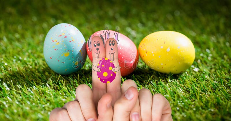 Animation of Hands with Drawings of Rabbit with Easter Egg Over Easter Eggs on Grass Stock Video ...