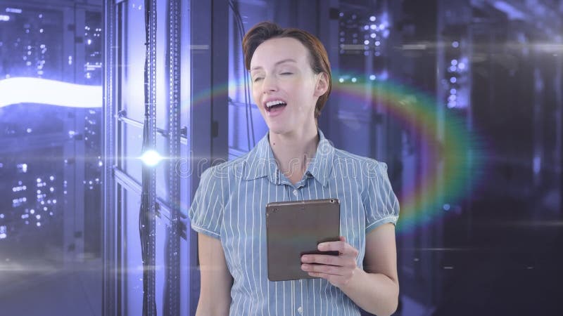 Animation of Happy Caucasian Woman Using Tablet Over Lights and Data ...