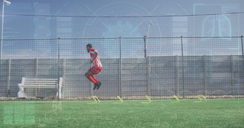 Male Footballer Looks at a Camera, Posing with a Ball, Close Up. Stock ...