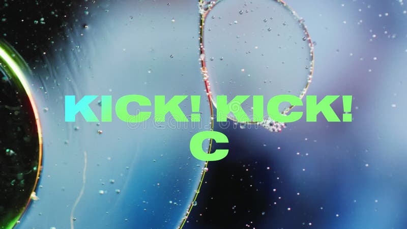 Animation of Kick Text Over Close Up of Liquid and Baubles Stock ...